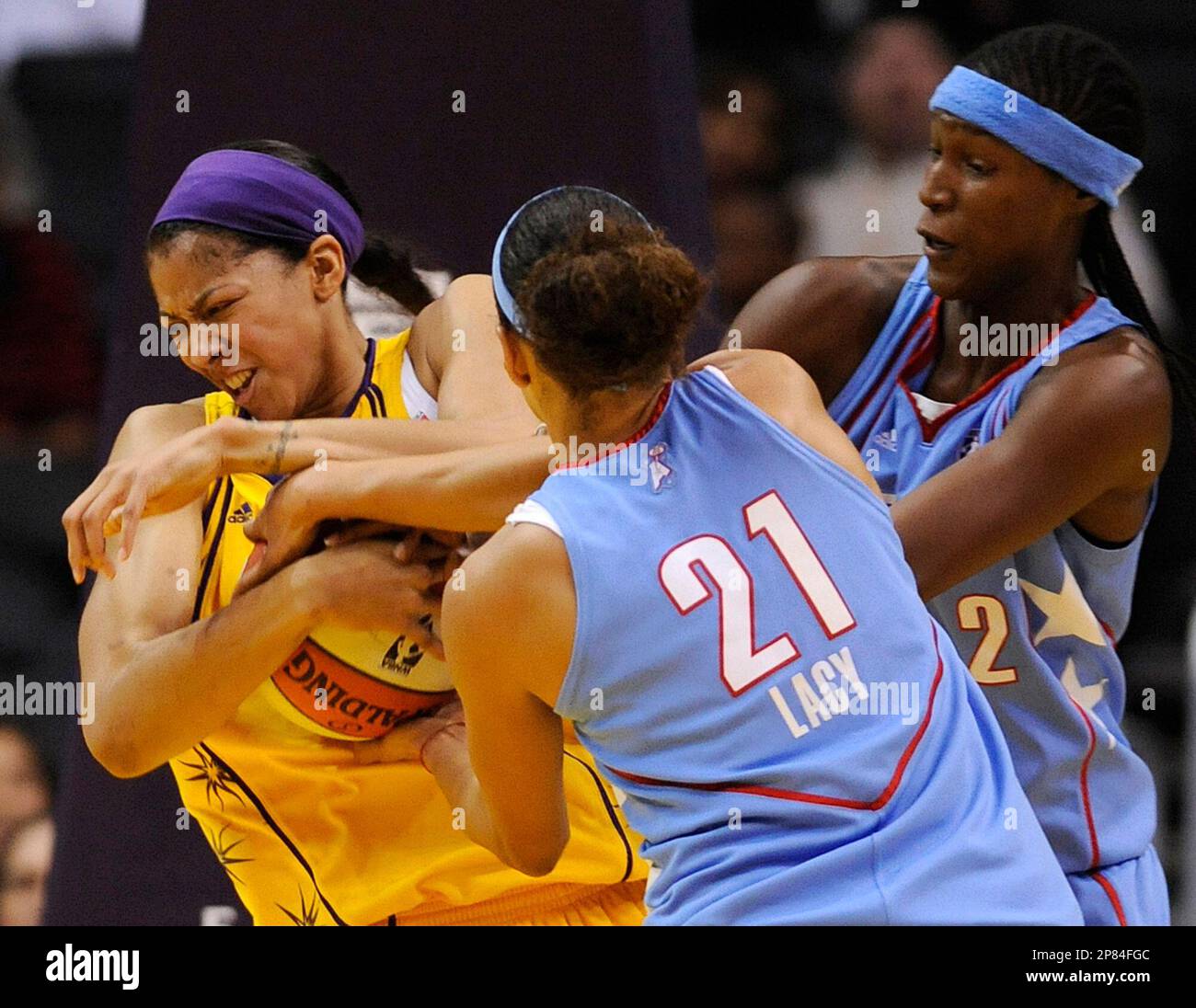 Los Angeles Sparks' Candace Parker, left, rips the ball away from ...