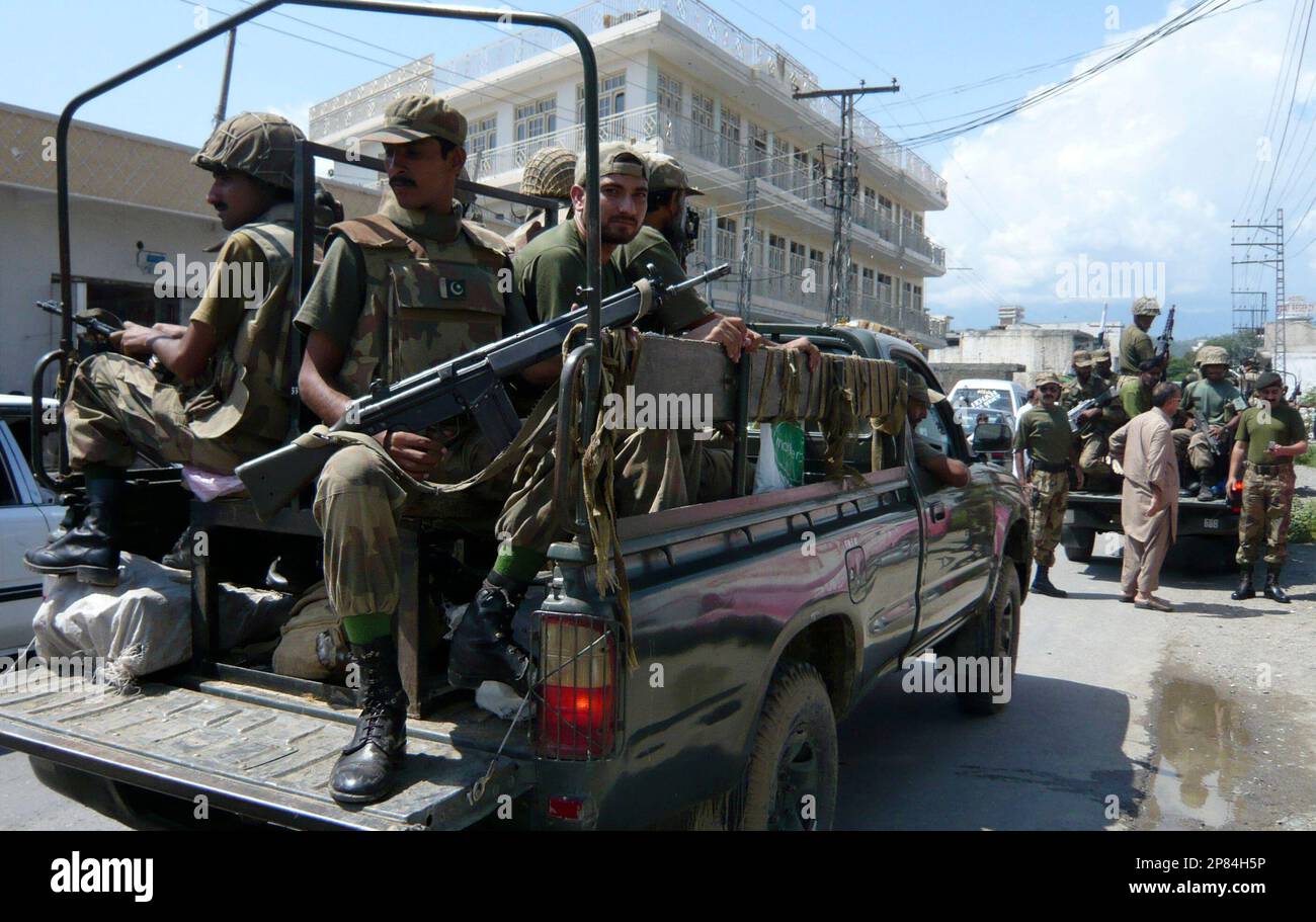 Pakistan Army soldiers patrol in Kanju, near Mingora, capital of ...