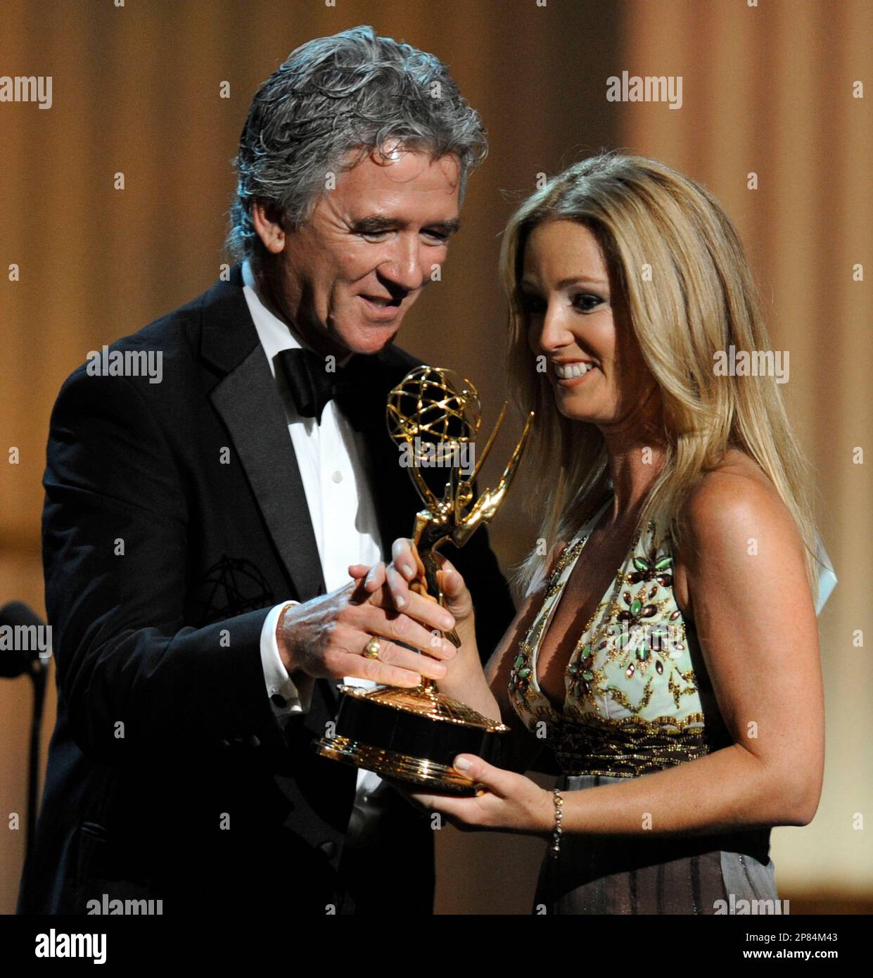 Patrick Duffy, left, presents Susan Haskell with the outstanding lead ...