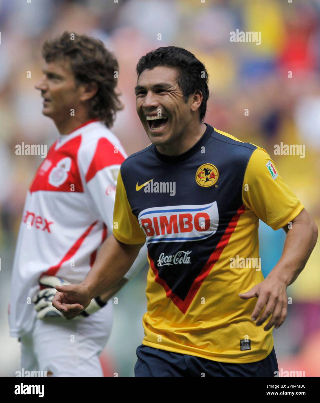 America's Salvador Cabanas, front, of Paraguay, celebrates after ...