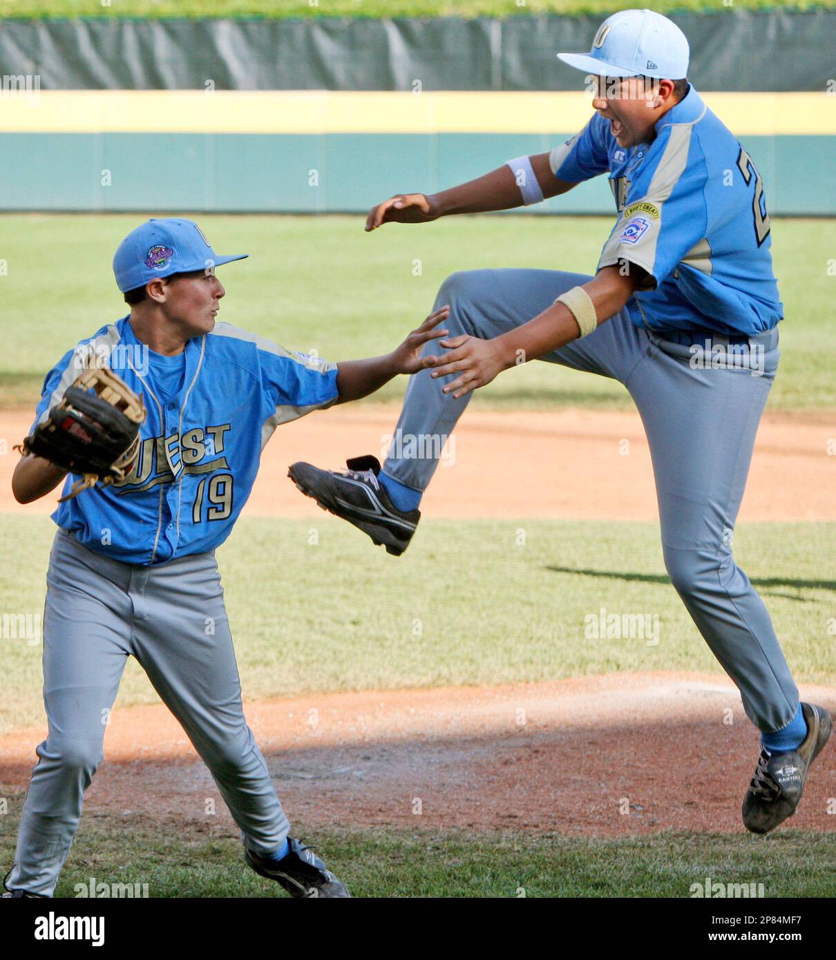Chula Vista, Calif., first baseman Luke Ramirez, right, celebrates with ...