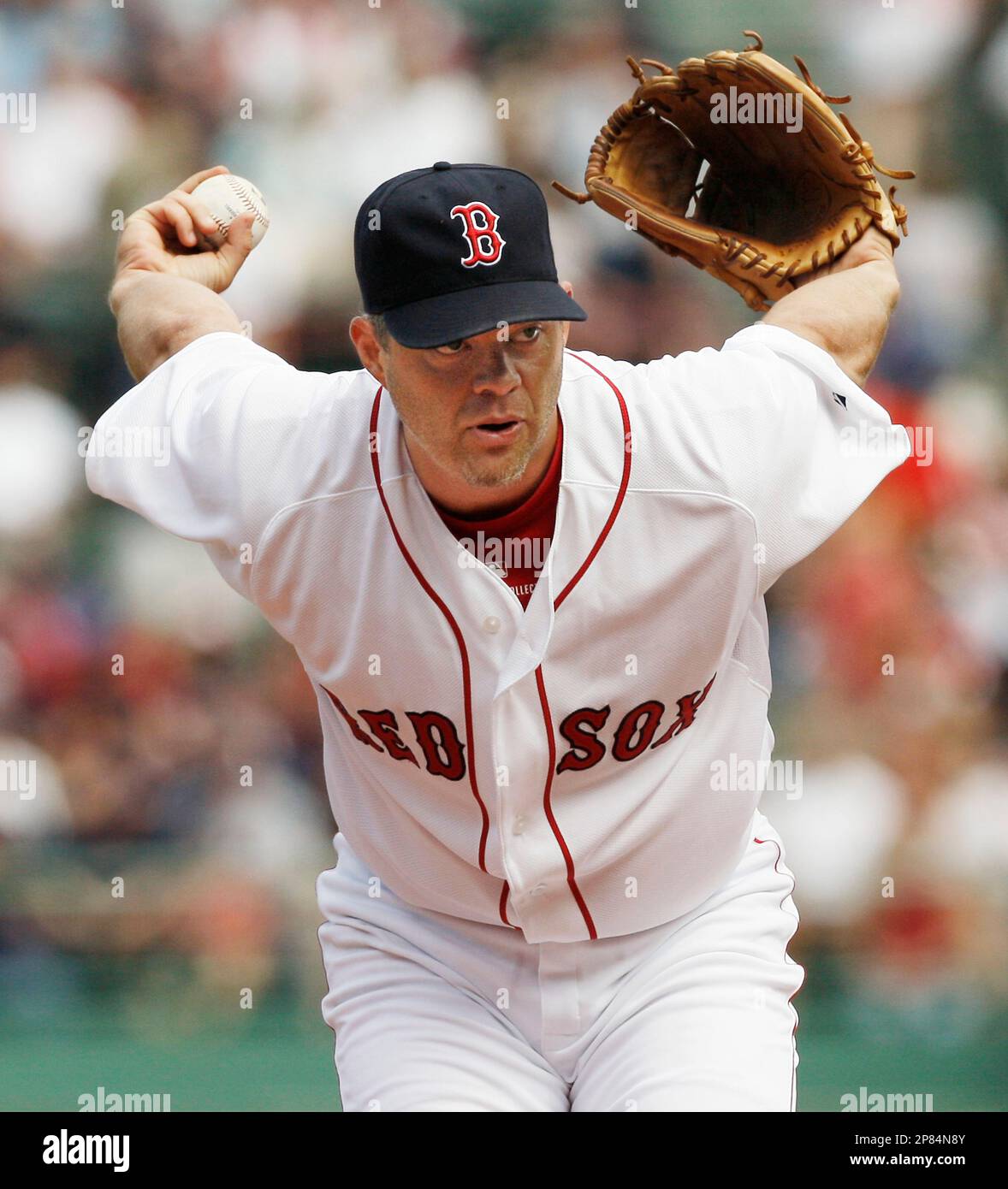 Boston Red Sox starting pitcher Paul Byrd winds up to deliver against ...