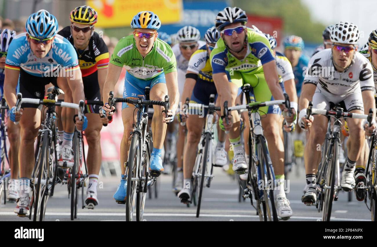 American Tyler Farrar, wearing the best sprinter's green jersey, center ...