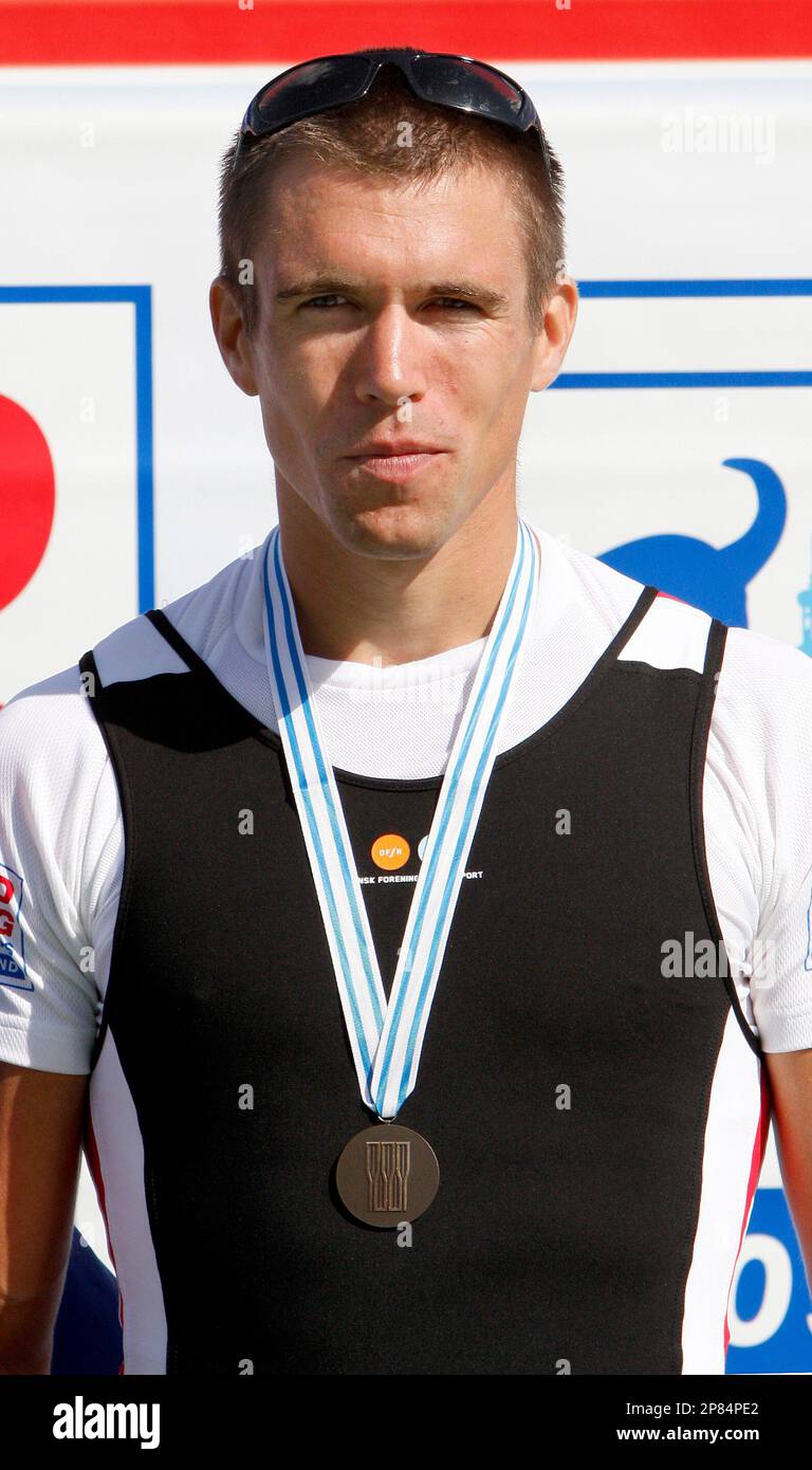 Denmark's bronze medalist Mads Rasmussen poses after the medal ceremony ...
