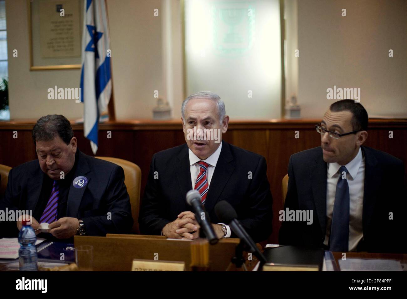 Israeli Prime Minister Benjamin Netanyahu, center, attends a weekly ...