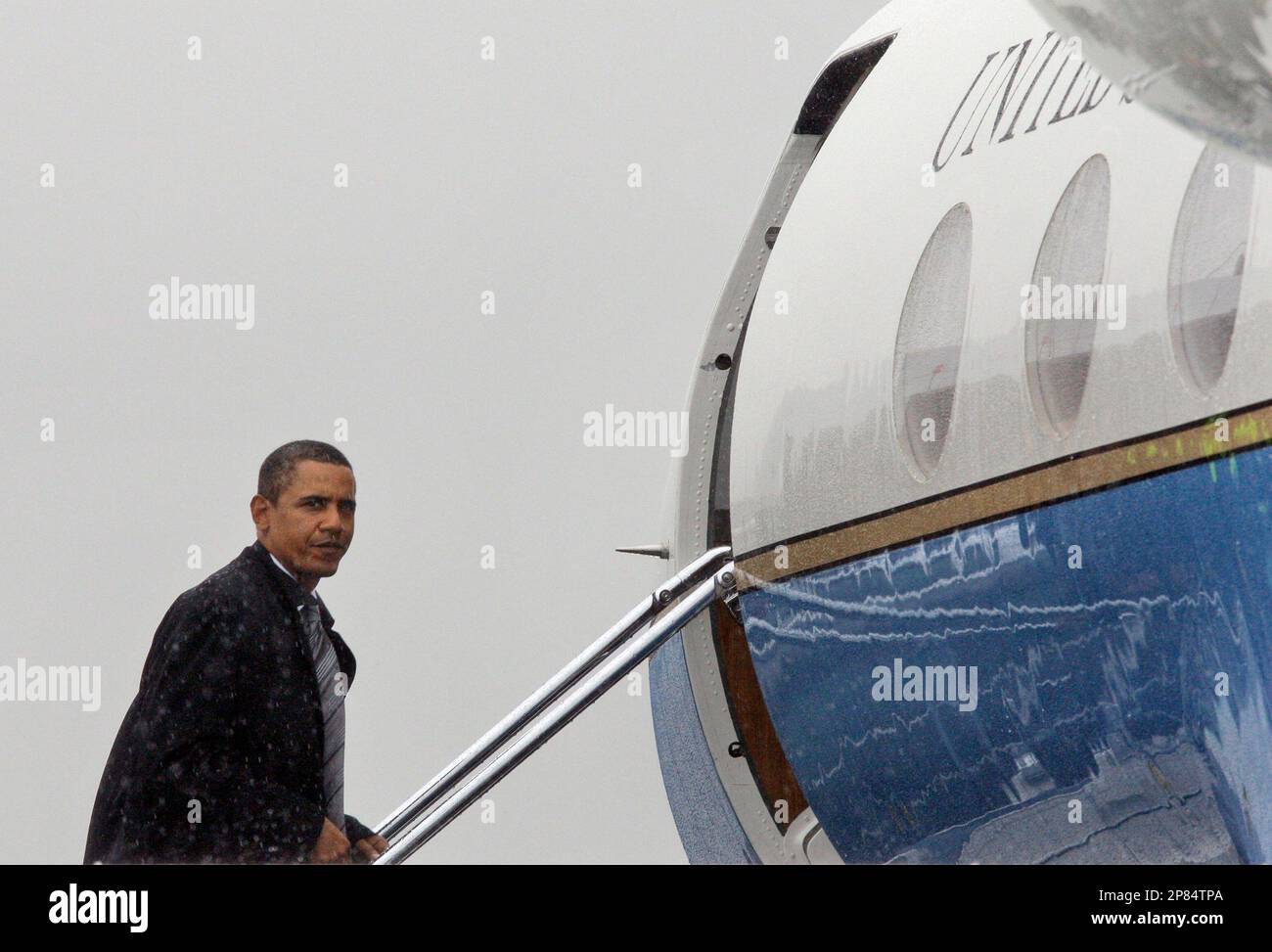President Barack Obama boards Air Force One at Logan International ...