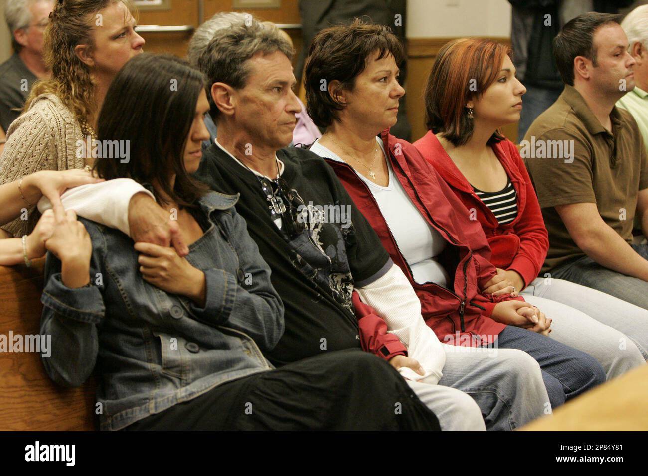 From left, Matthew Landry's sister Gina Harriman, parents Robert and ...