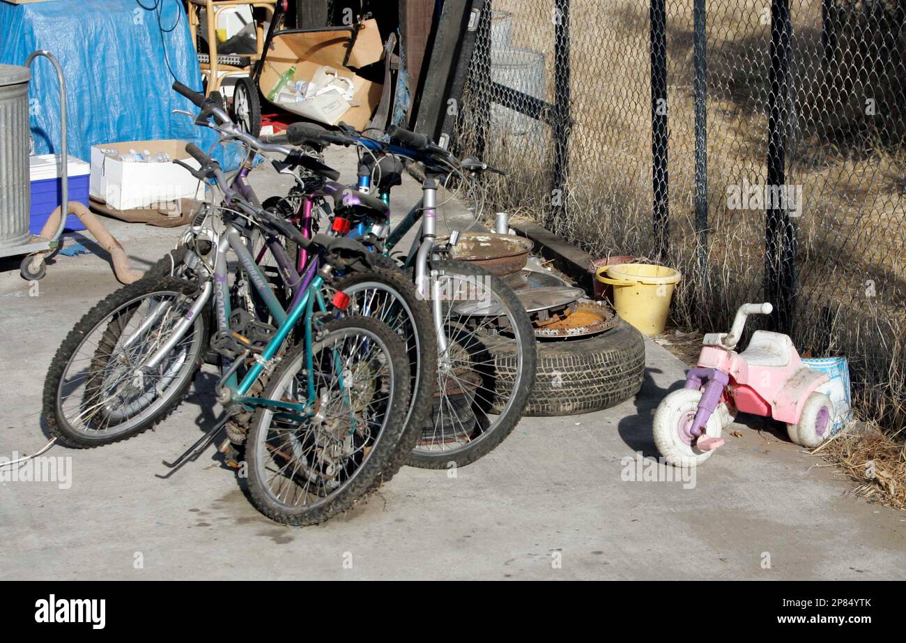 Bikes and a kid's trike is shown at a home in Antioch, Calif., Friday ...