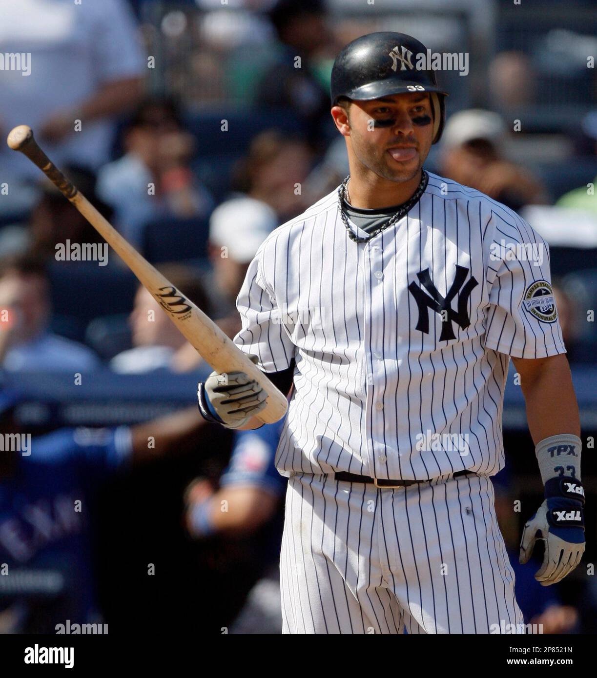 New York Yankees batter Nick Swisher reacts after striking out with two ...