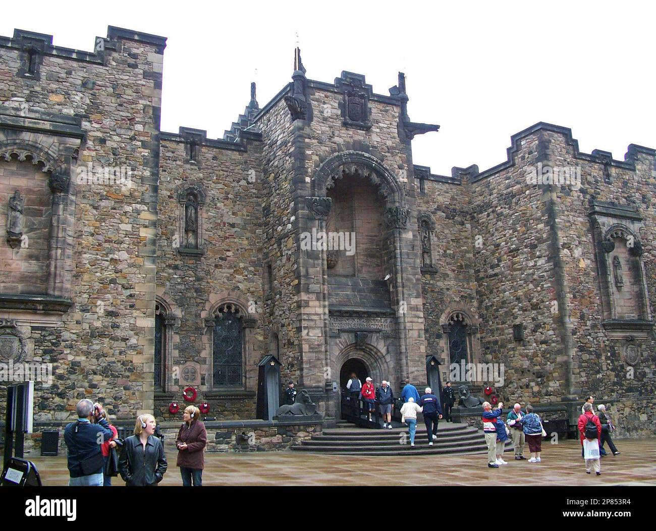 FILE - In this June 2006 file photo, visitors, some with audio guide ...