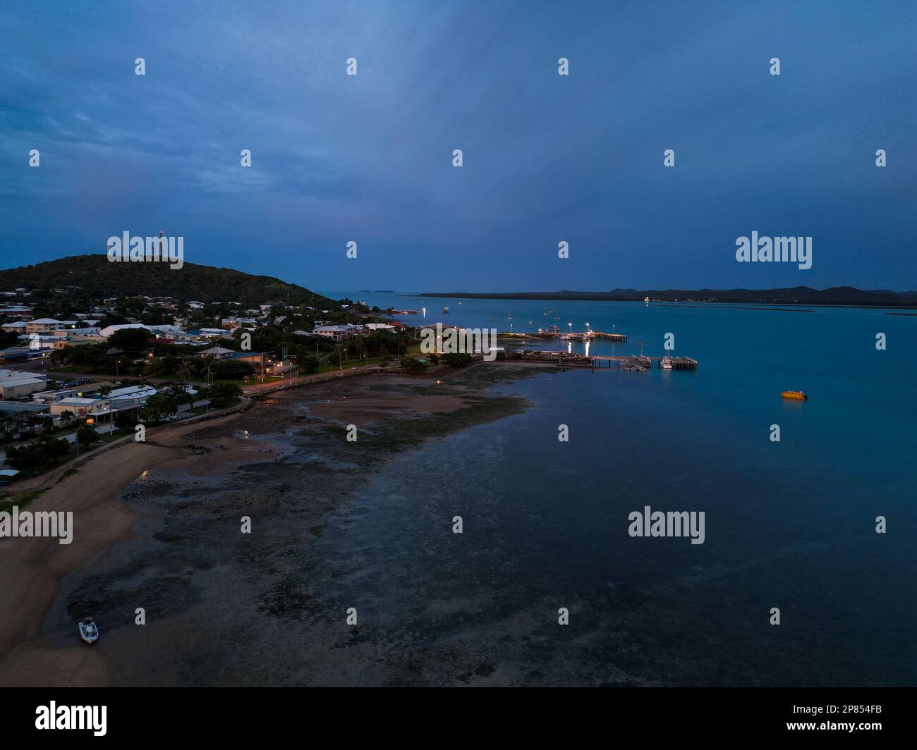 Aerial sunset showing the beach and town of Torres Strait islands Stock ...