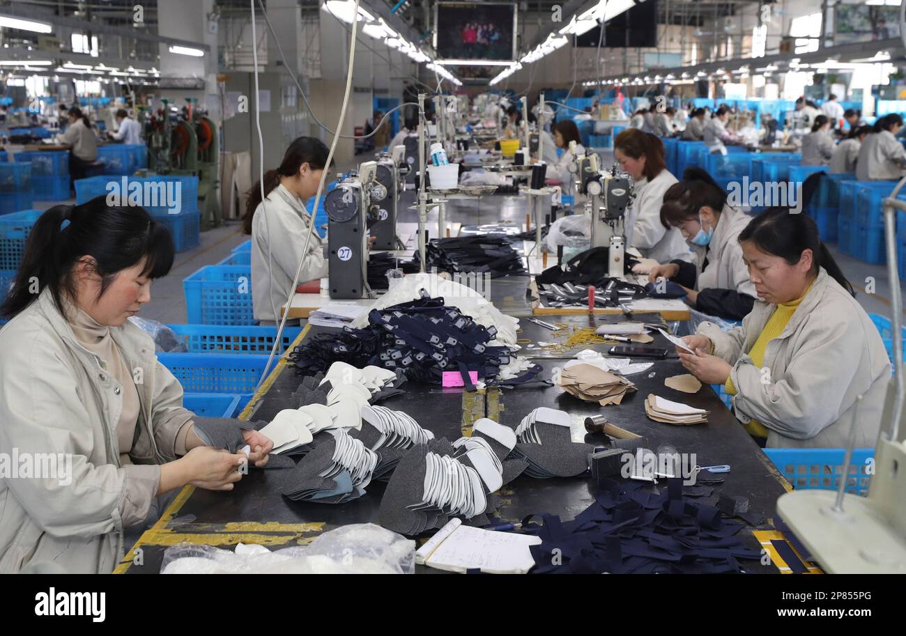 Female workers process leather shoes hi-res stock photography and ...