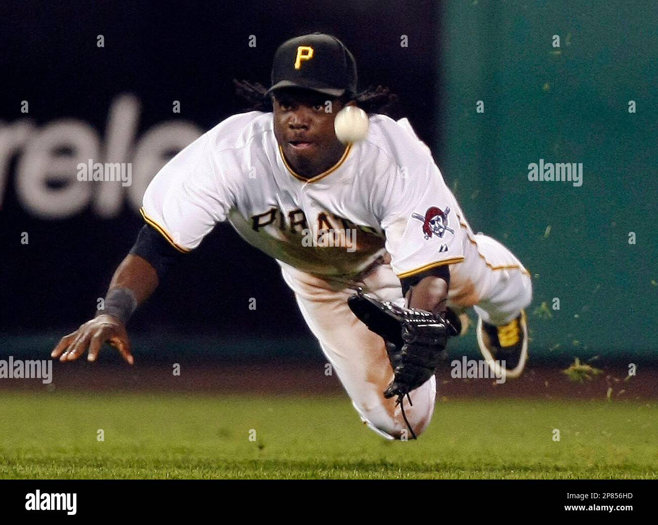 Pittsburgh Pirates left fielder Lastings Milledge misses a ball as he ...