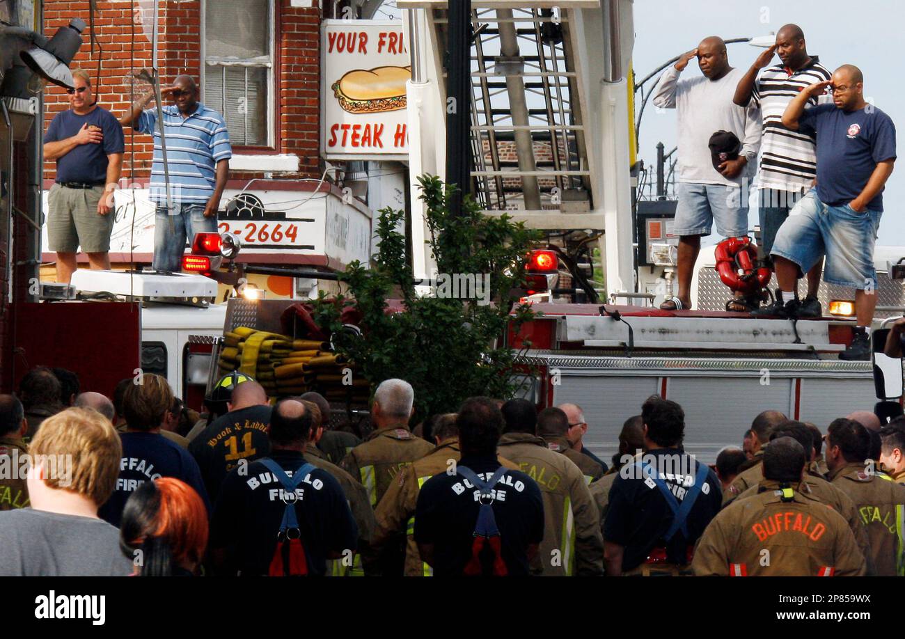 Buffalo firefighters salute as they remove bodies of fellow ...