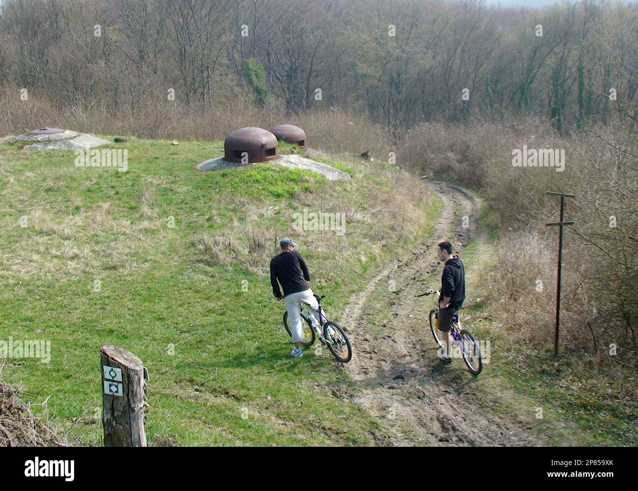 In this April 5, 2009 photo, bikers take a break next to armoured ...