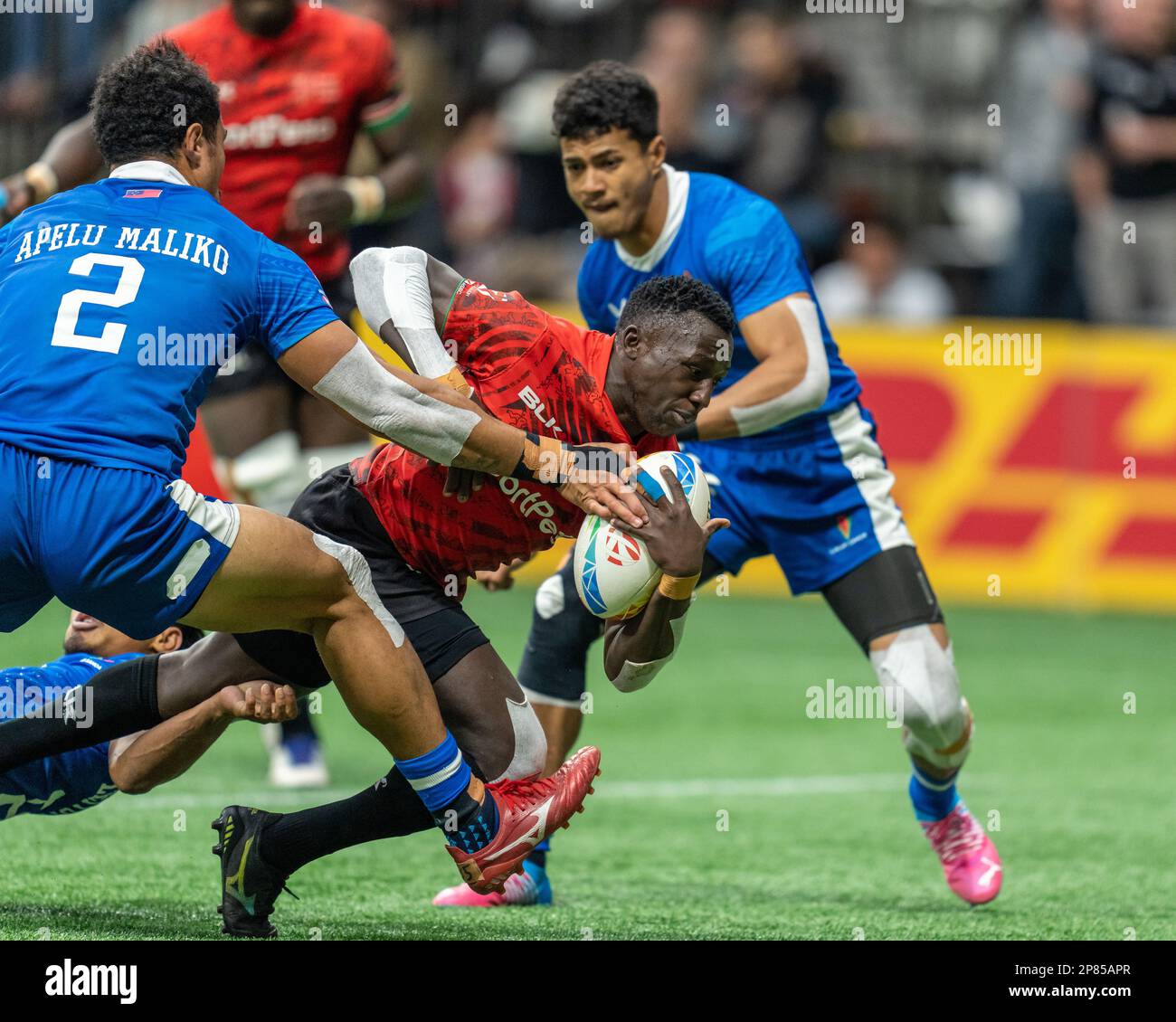 Vancouver, Canada. 5th March, 2023. Brian Tanga of Kenya (C) dives in ...