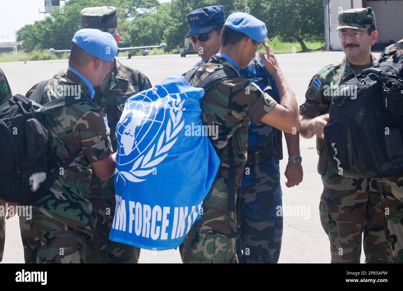 Members of the Salvadorean Army are welcomed by fellow officers at the ...