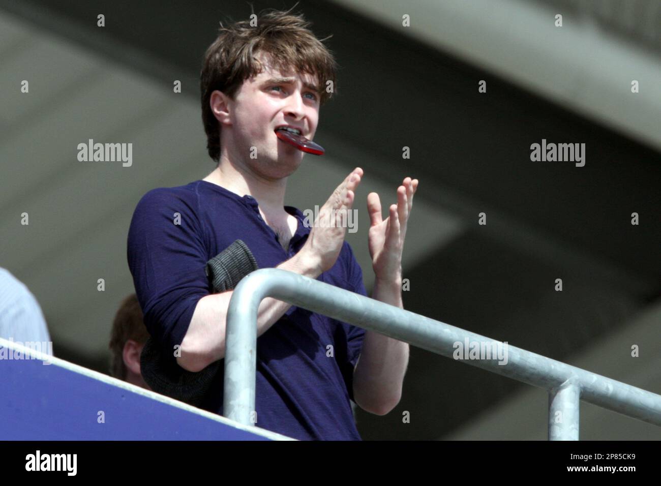 Actor Daniel Radcliffe claps during the fourth day of the fifth Ashes ...