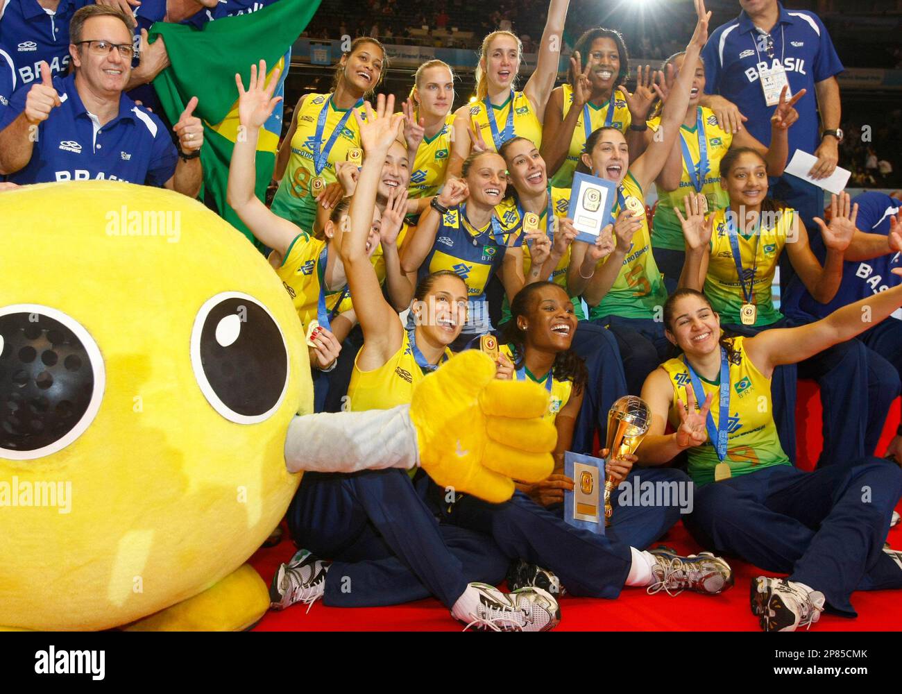 Brazilian team members pose for photos at an award ceremony at the 2009 ...