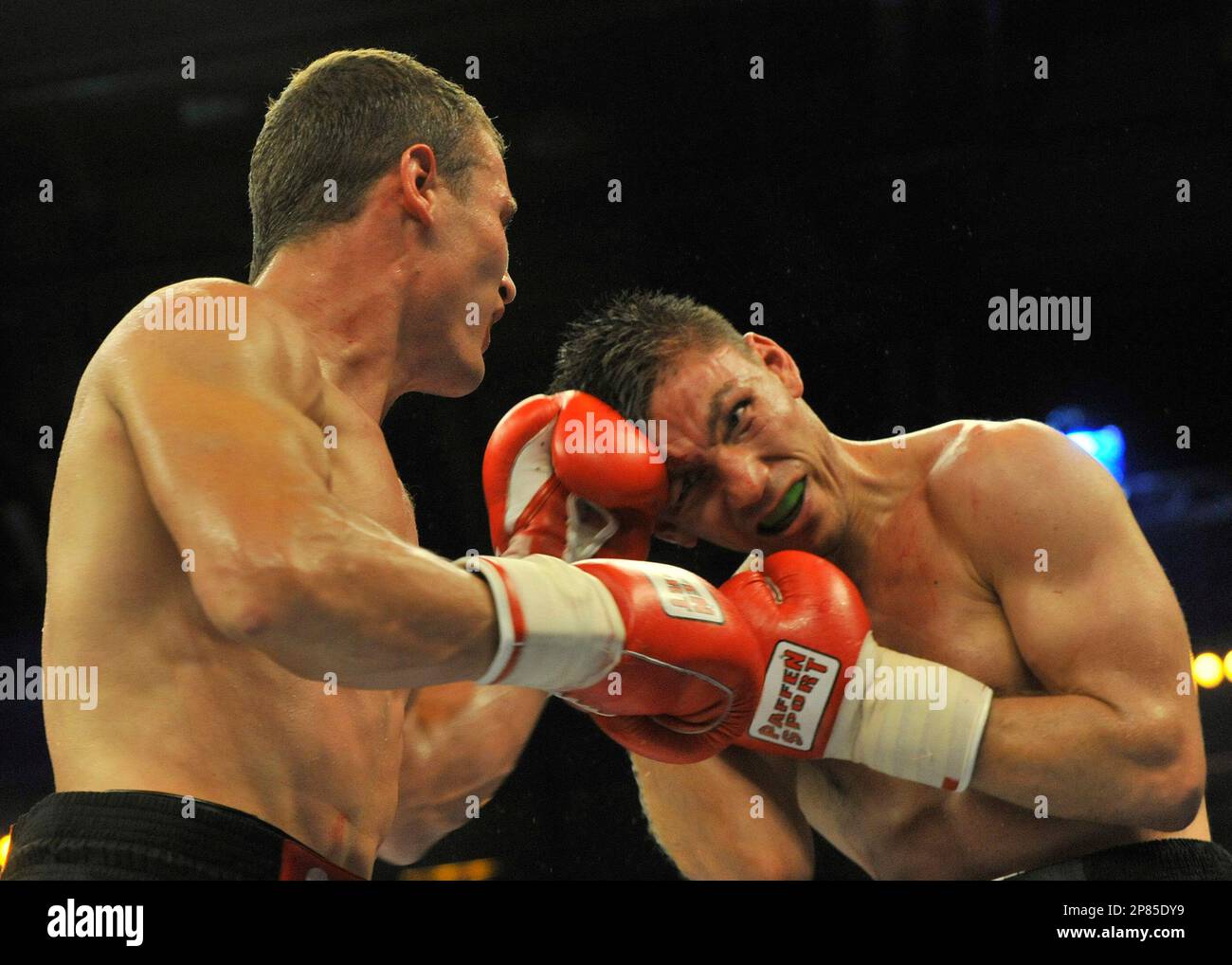 Germany's super middleweight boxer Robert Stieglitz, left, and Hungary ...