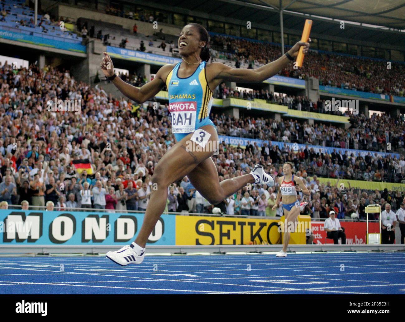 Bahamas' Debbie Ferguson-McKenzie crosses the finish line to take the ...