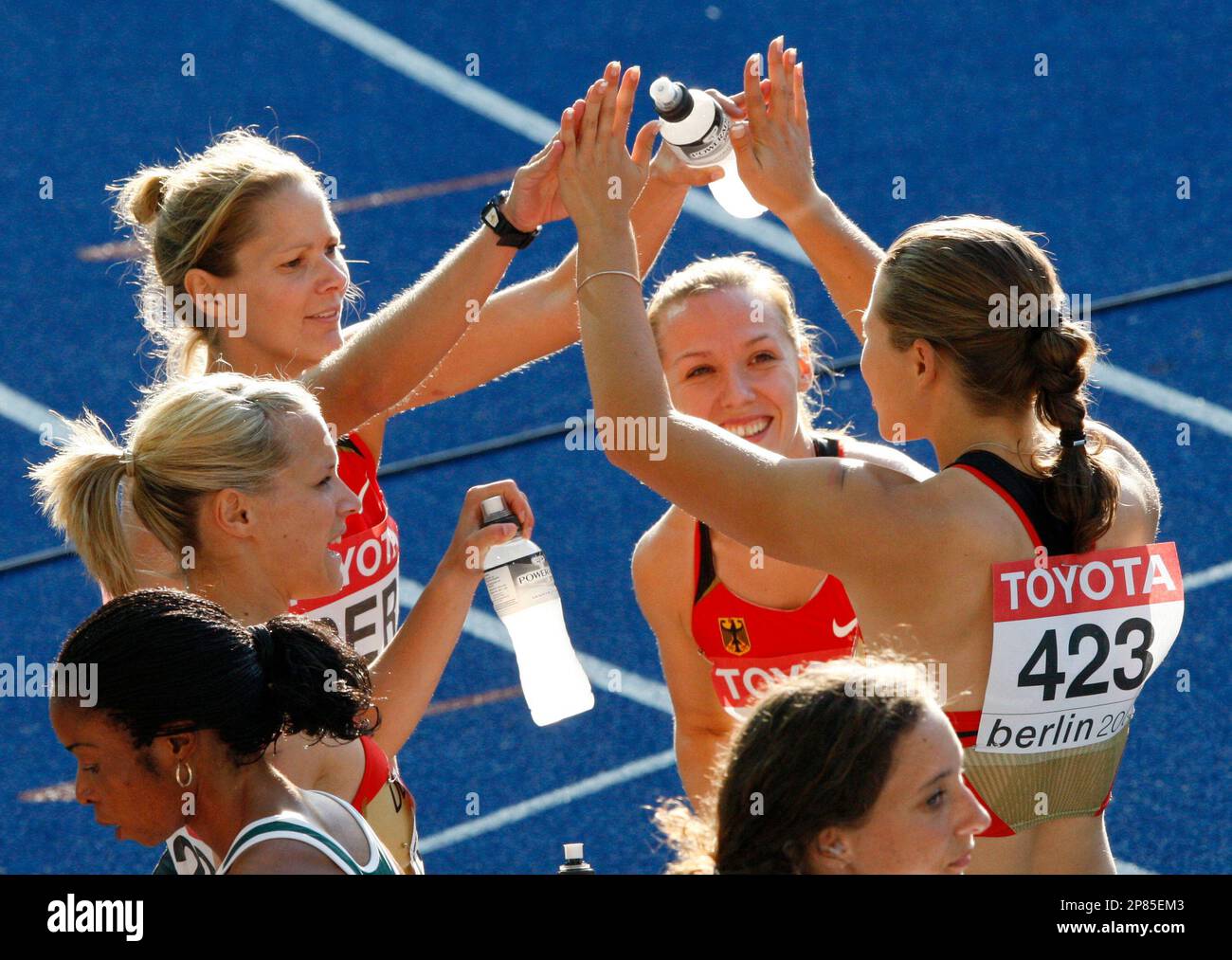 Germany's women's 4x100m relay team celebrates after winning a semi ...