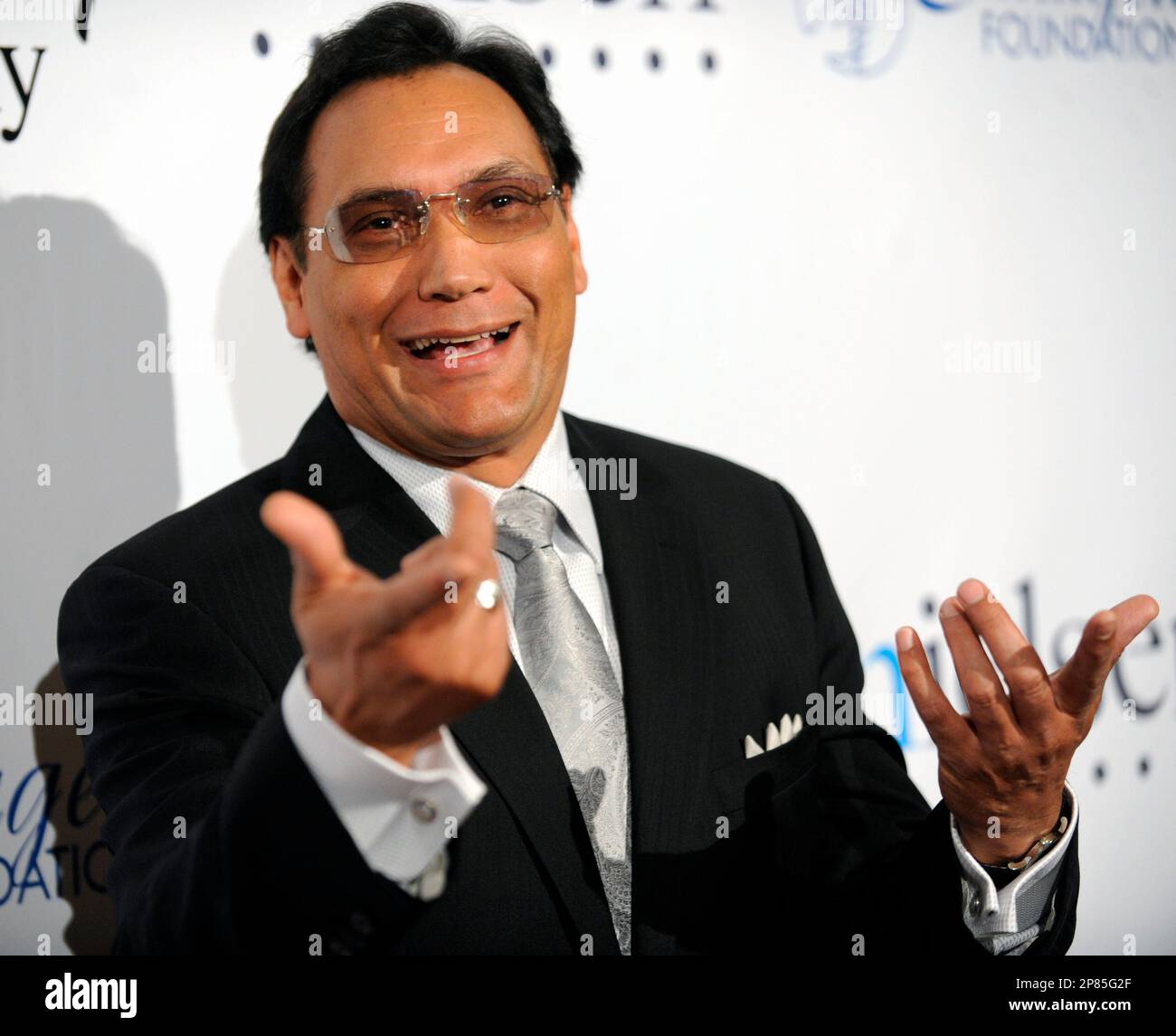 Actor Jimmy Smits interacts with photographers as he arrives for the ...