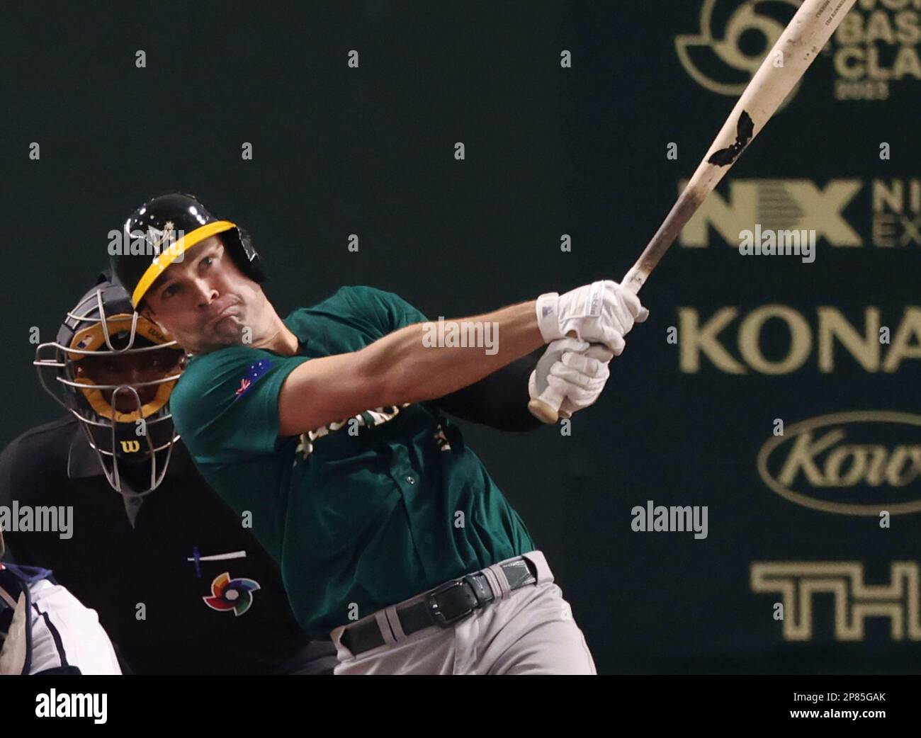 Australia's Tim Kennelly homers on a fly ball to left center field in ...