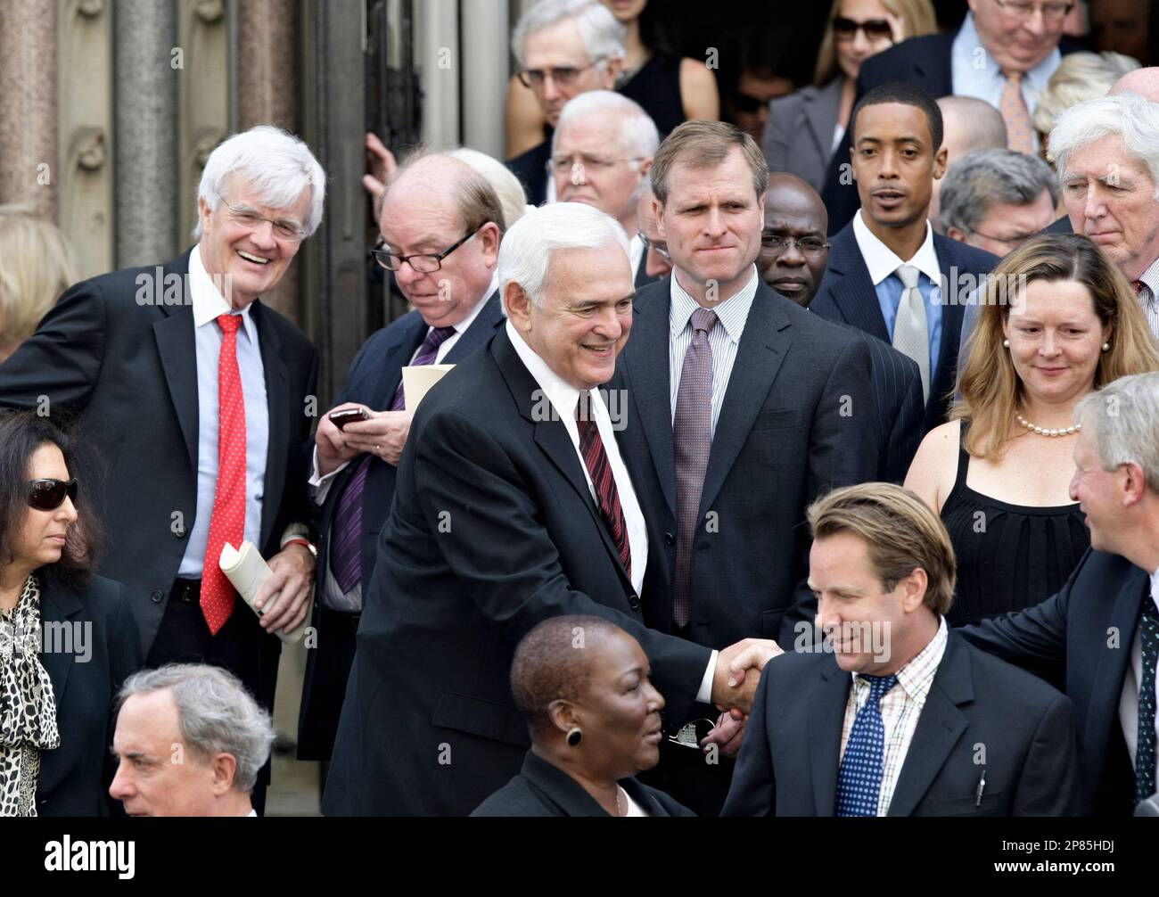 Friends, family and fellow journalists leave the funeral service of ...