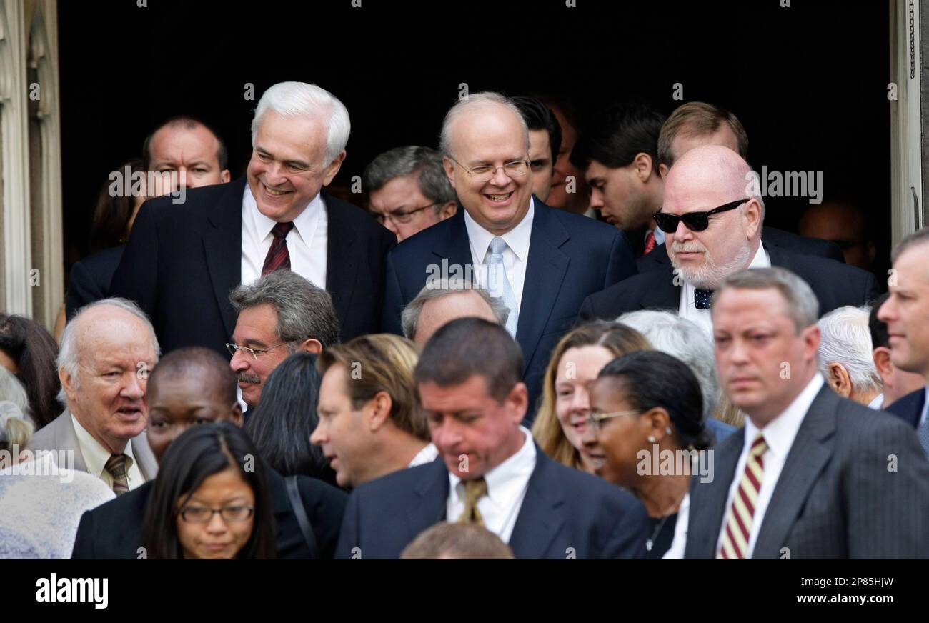 Friends, family and fellow journalists leave the funeral service of ...