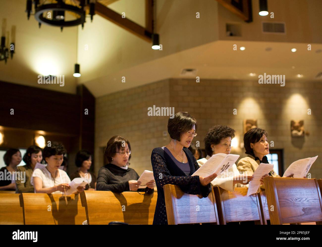 In this photo taken Monday, Aug. 10, 2009, members of the St. Thomas ...
