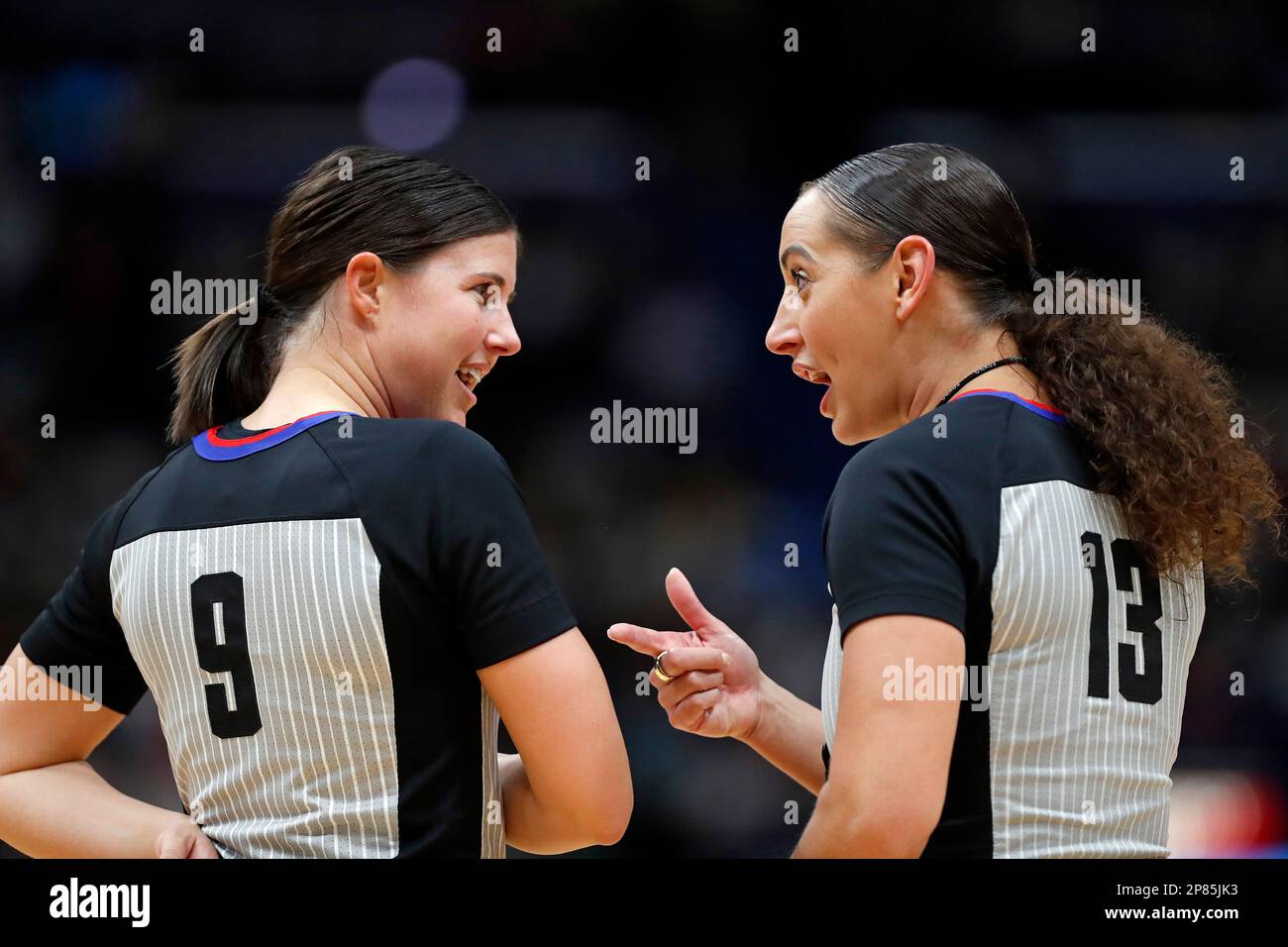 Referee Natalie Sago (9) speaks with referee Ashley Moyer-Gleich (13 ...