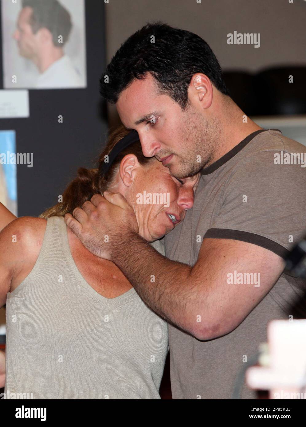 Lisa Lepore, mother of former model Jasmine Fiore, is comforted by ...