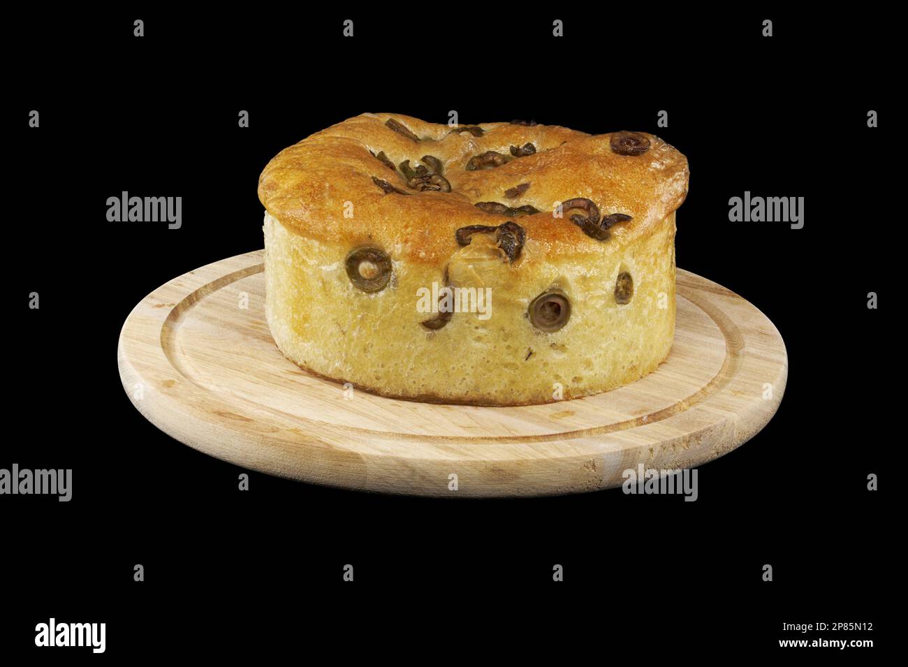 Round focaccia bread with olives over black background Stock Photo - Alamy