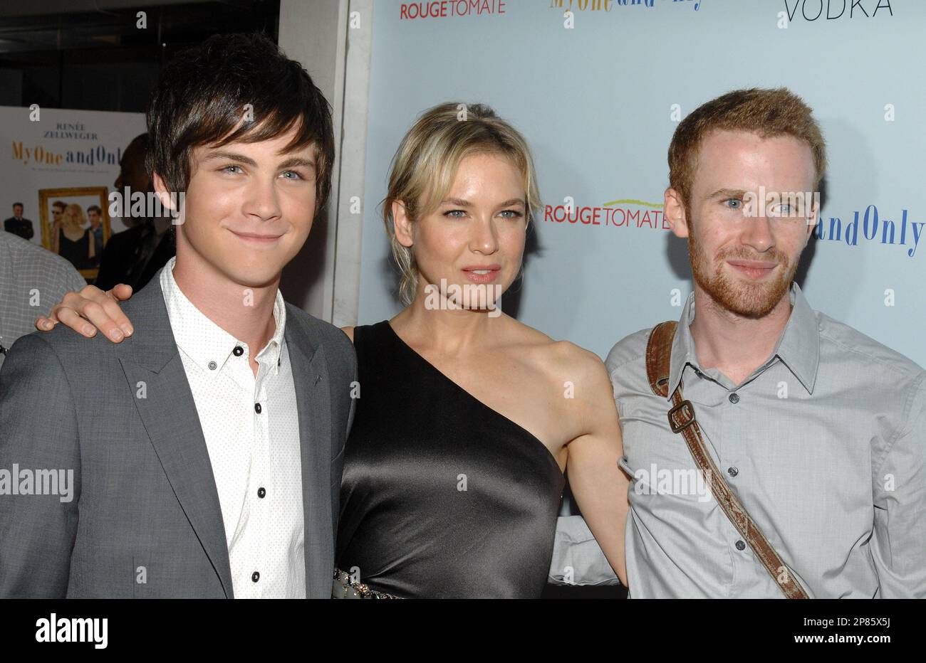 From left, actors Logan Lerman, Renee Zellweger and Mark Randall attend ...
