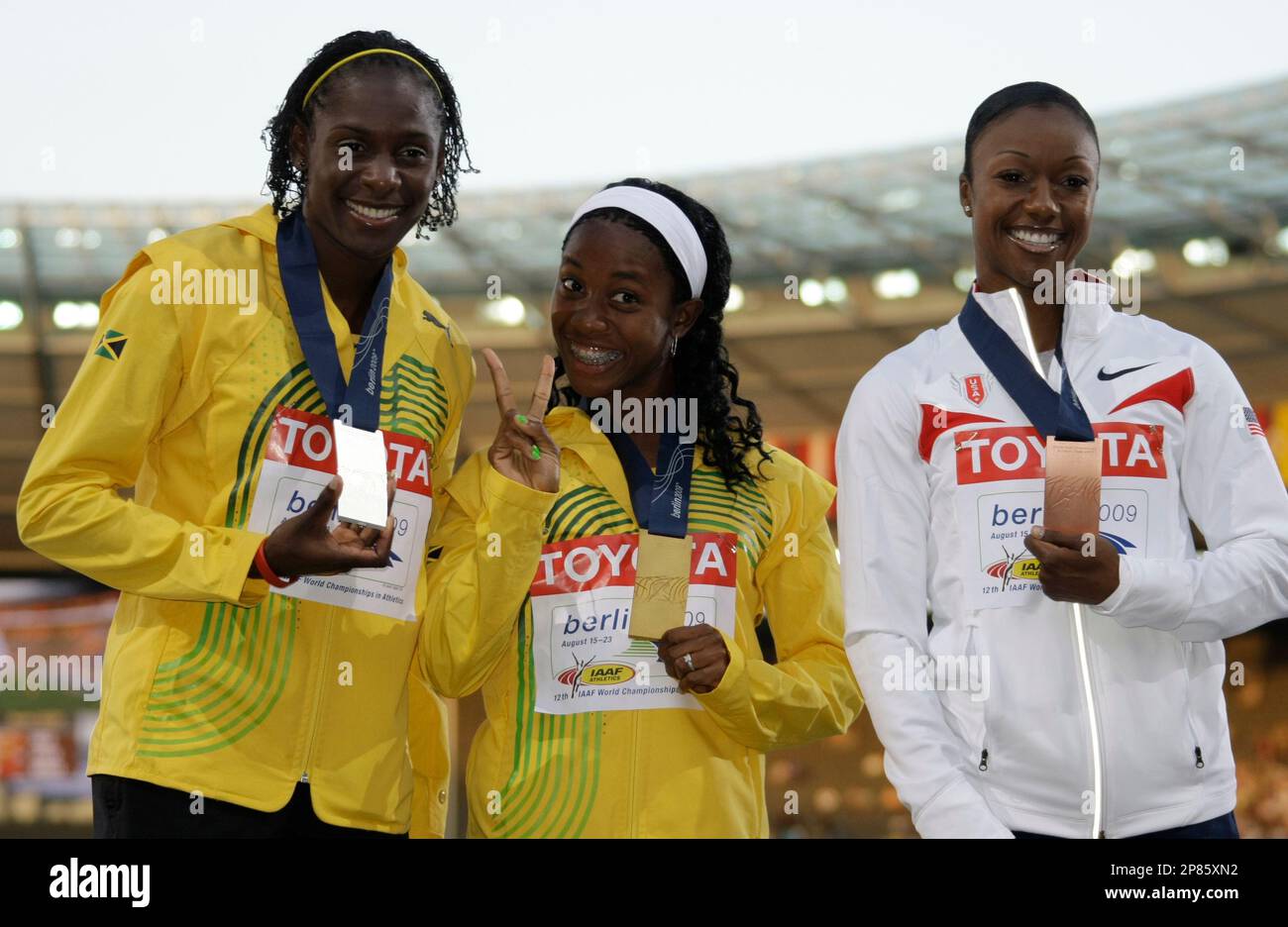 Jamaica's gold medal winner Shelly-Ann Fraser is flanked by silver ...