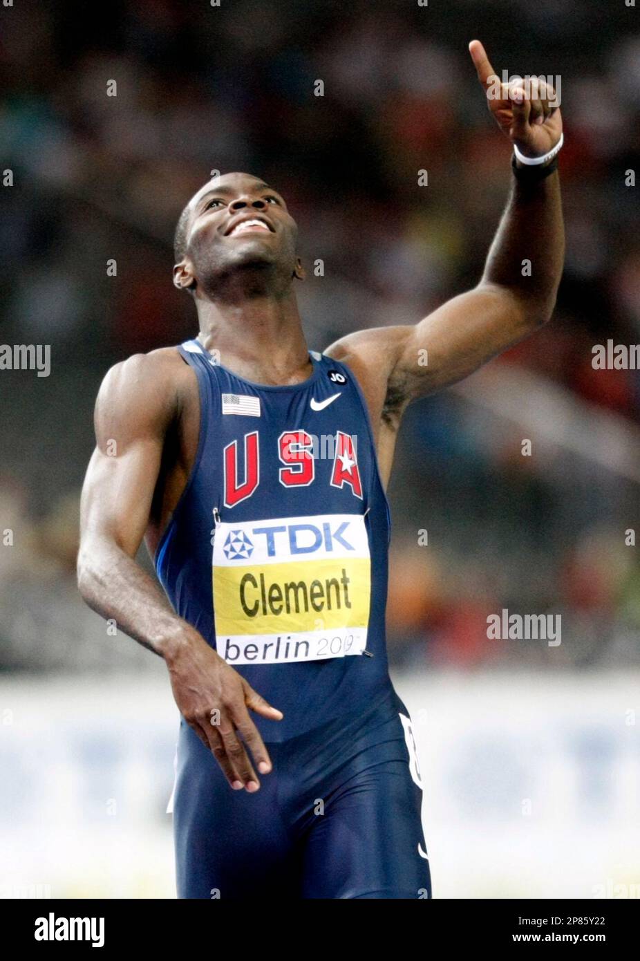 United States' Kerron Clement reacts after crossing the finish line to ...