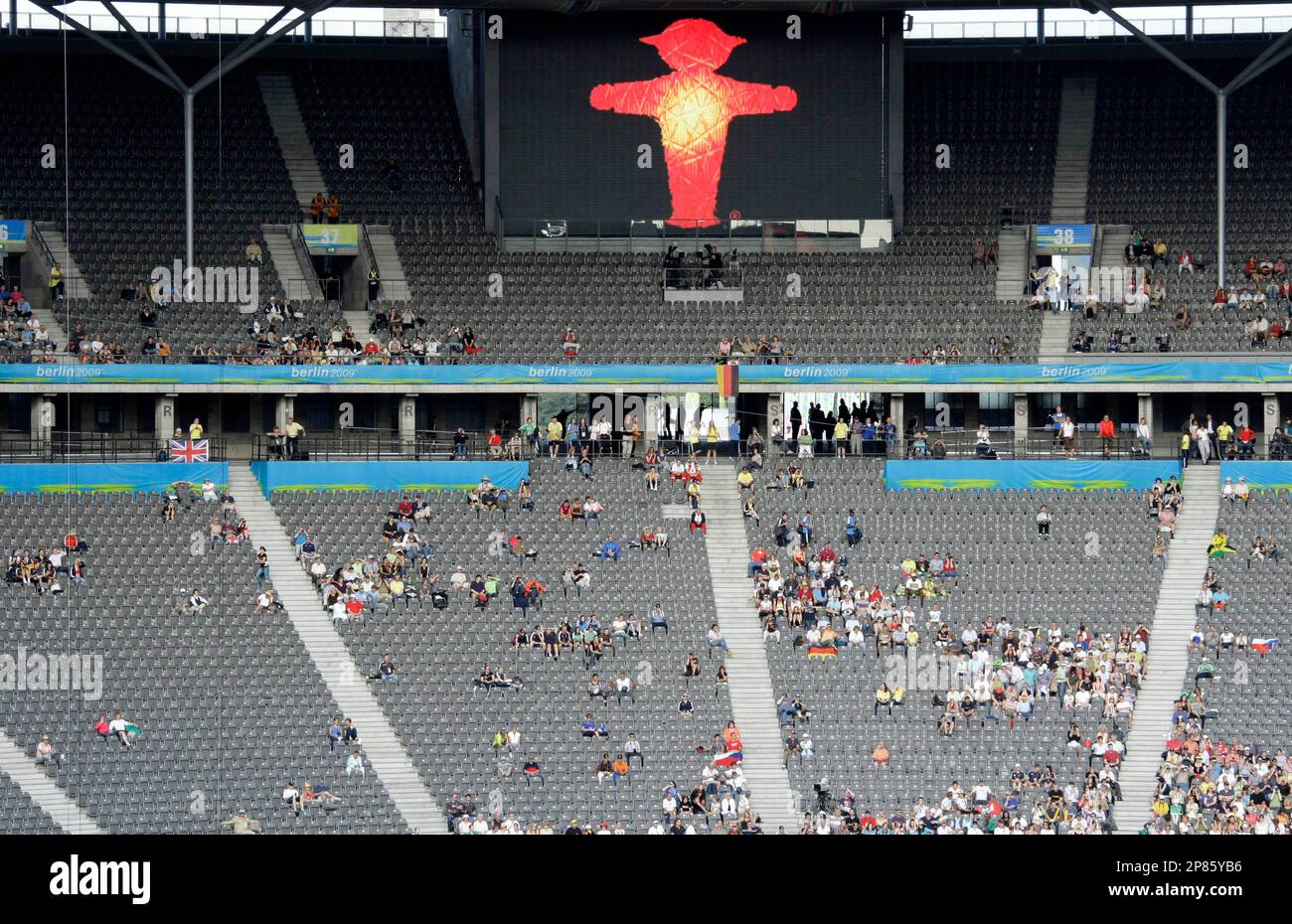 The traffic light sign 'Do not cross' is seen above empty seats in the ...