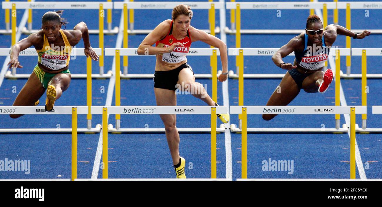 Damu Cherry, right, from the US, Germany's Carolin Nytra and Jamaica's ...