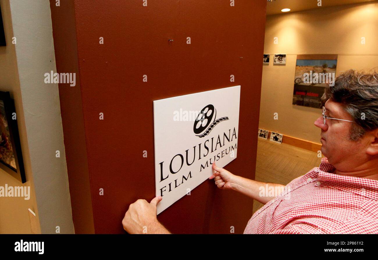 This Aug. 14, 2009 photo shows Jeffrey Pipes Guice holding signage for ...