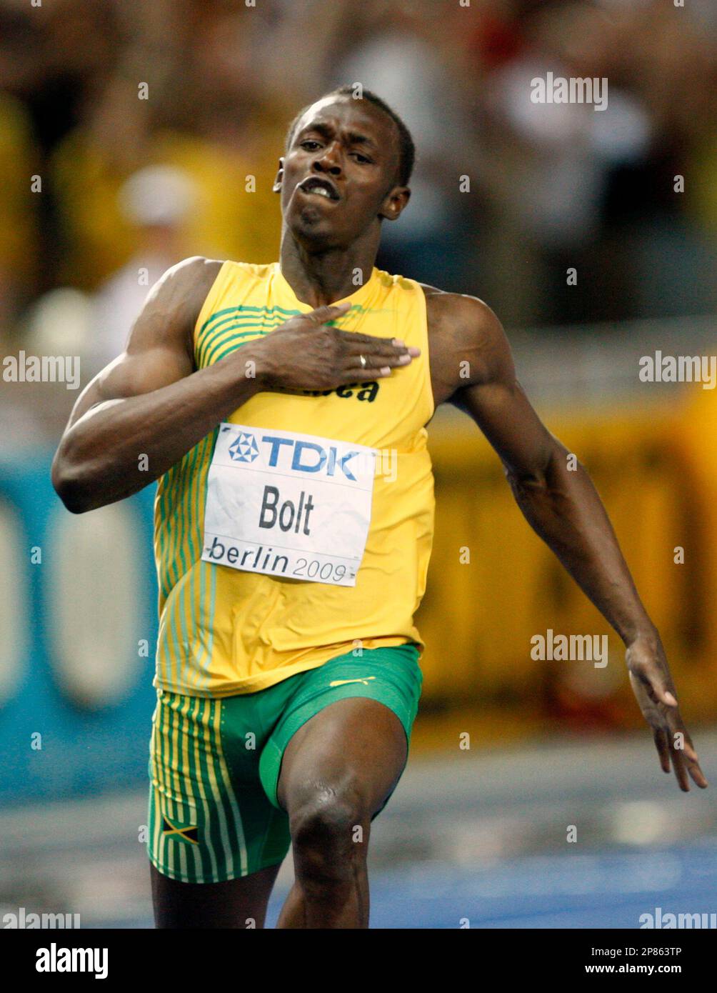Jamaica's Usain Bolt celebrates winning the final setting a new 100m ...