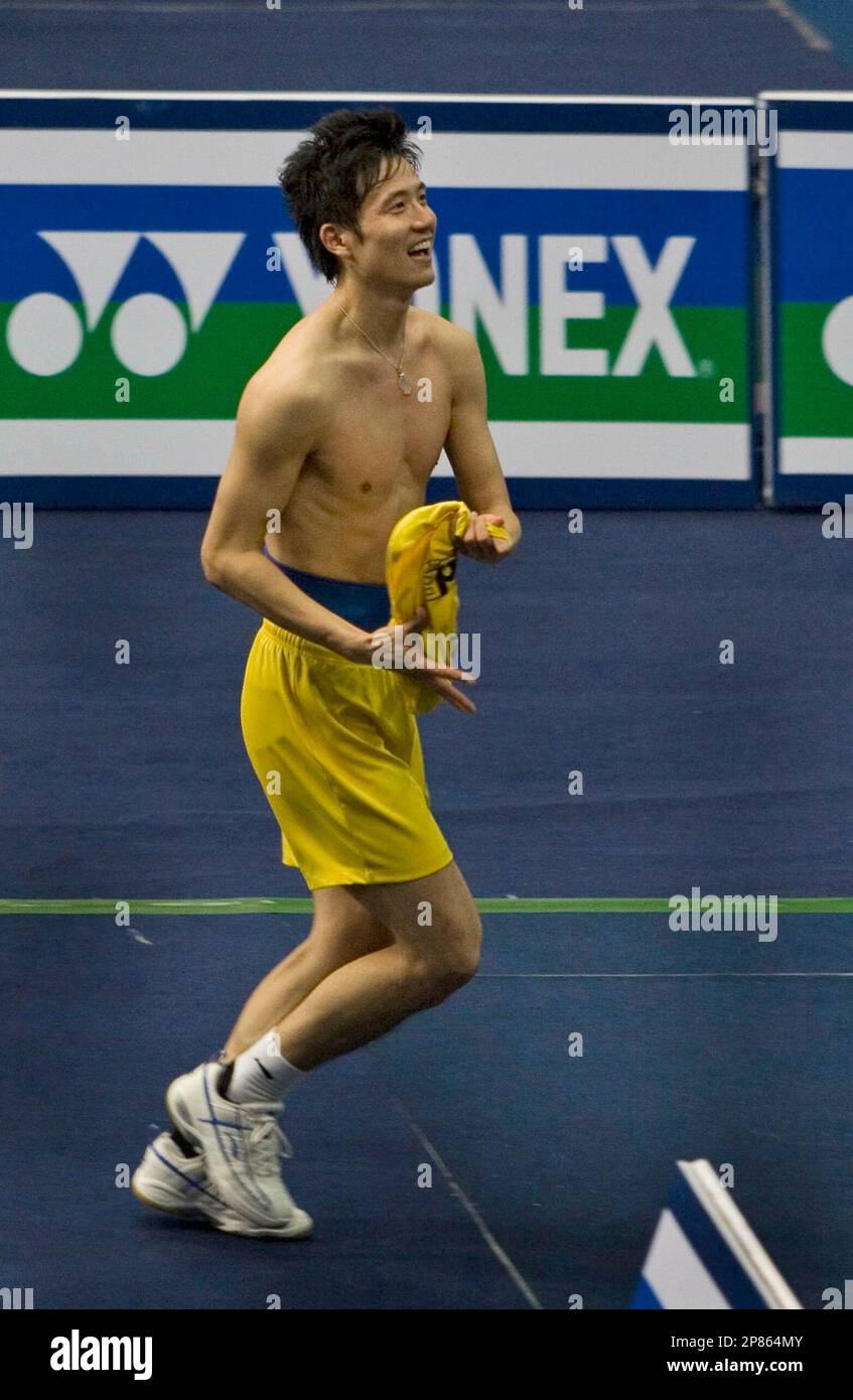 China's Cai Yun, reacts after he and teammate Fu Haifeng , unseen, won ...