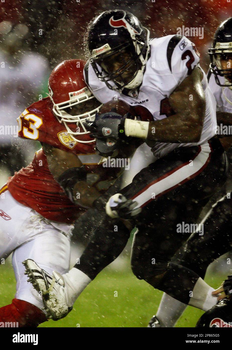 Houston Texans running back Ryan Moats (21) is hit by Kansas City ...