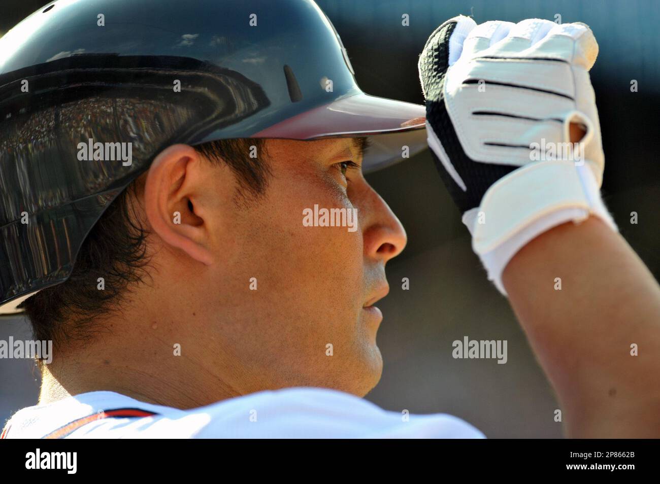 Atlanta Braves' Kenshin Kawakami, of Japan, adjusts his helmet as he ...