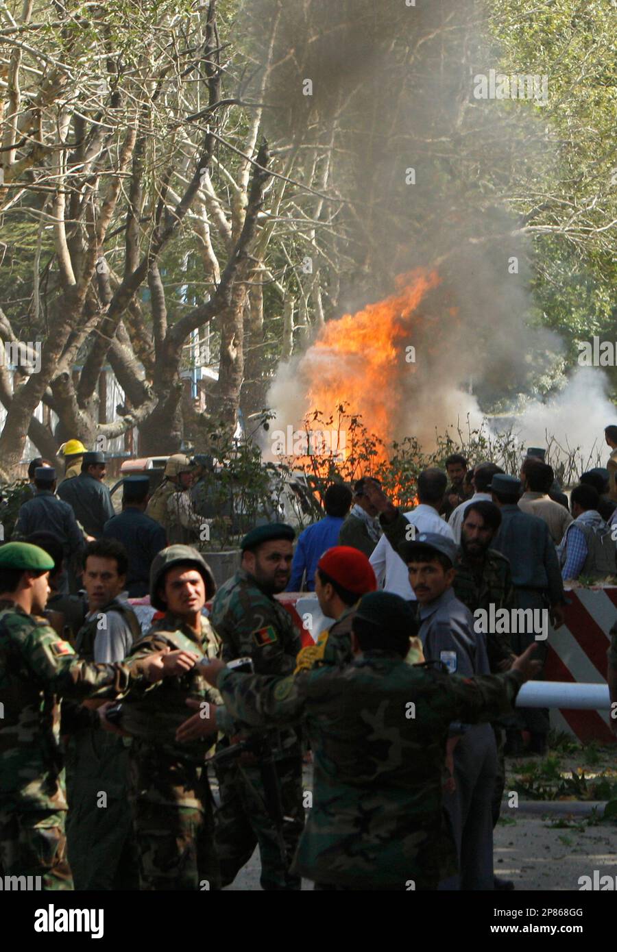 Fire comes out after a suicide car bomb explosion which occurred near ...