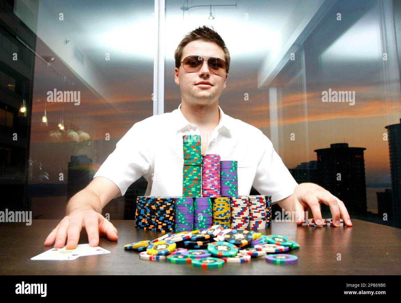 In this July 29, 2009 photo, holding pocket aces, local poker player ...