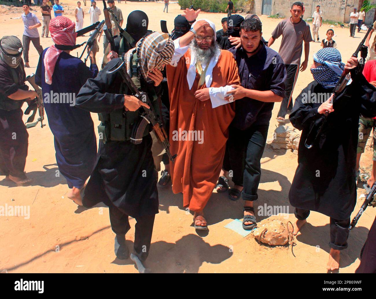 Abdel-Latif Moussa, center, the leader of the militant Islamic group ...