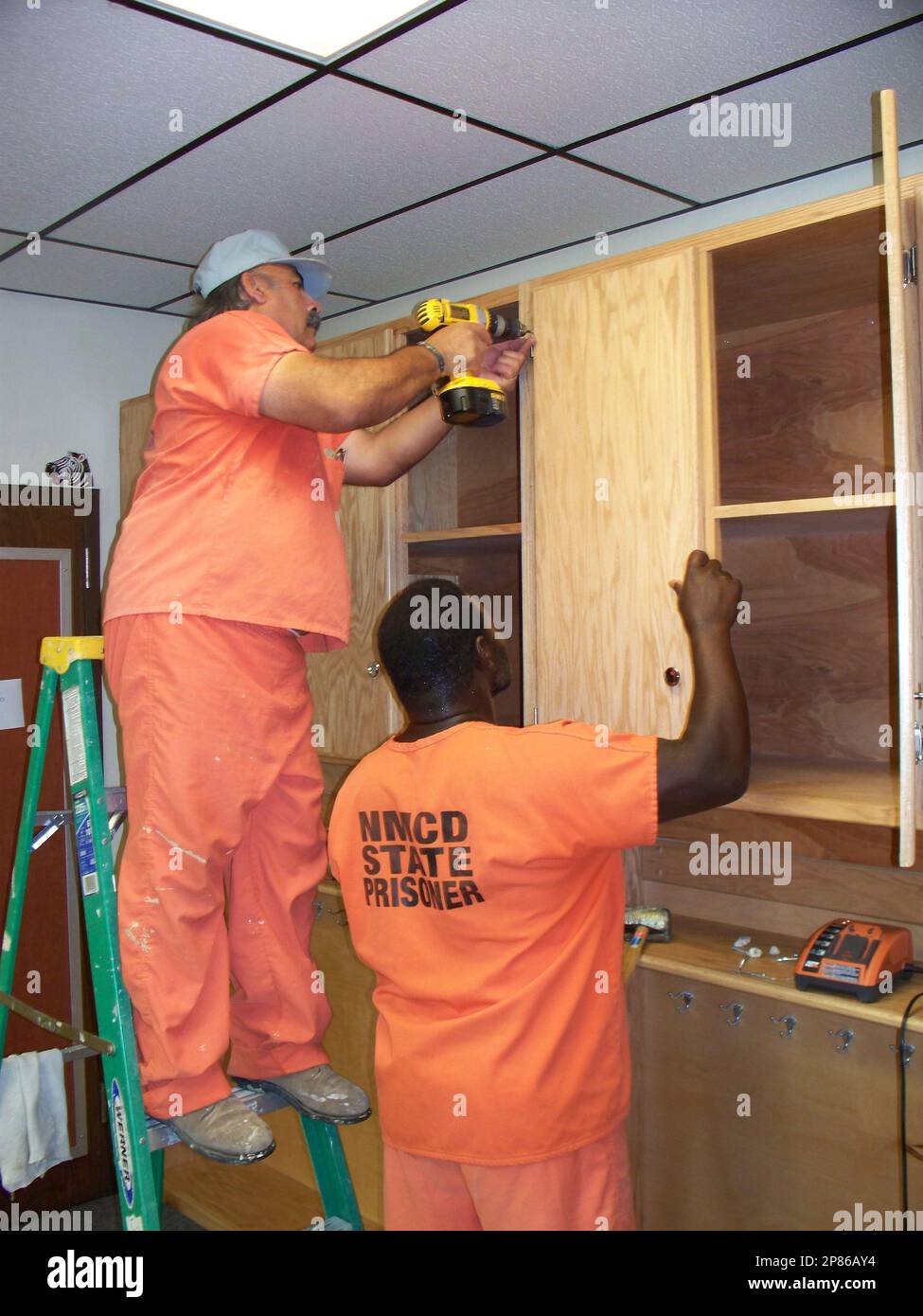 In this photo taken July 18, 2009, inmates from the Lea County ...