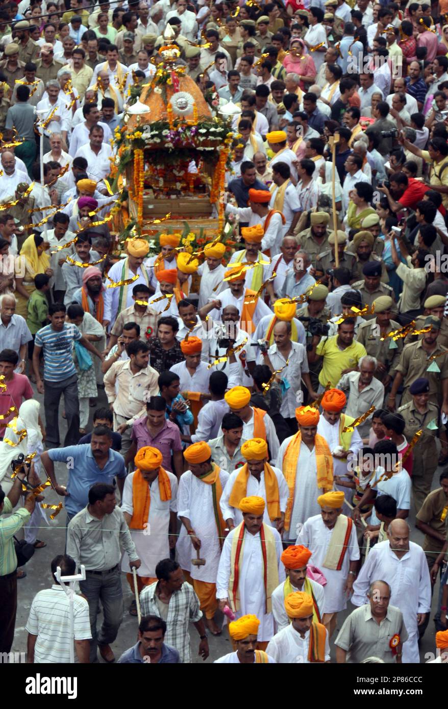 Hindu devotees of walk in a procession ahead of 'Janmashtami' festival ...