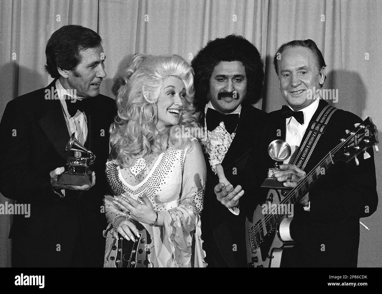 FILE - In this Feb. 19, 1977 file photo, Les Paul, right, and Chet ...